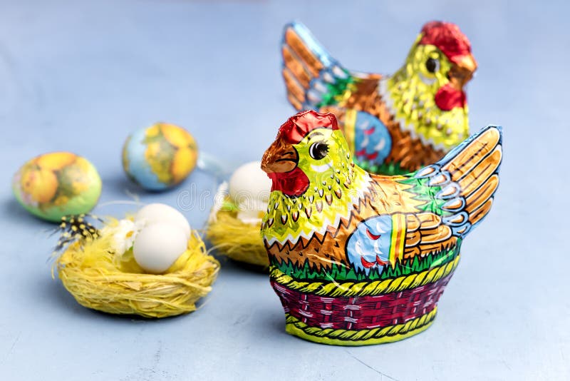 Easter Chocolate Chicken and Easter Eggs on Blue Background Festive ...