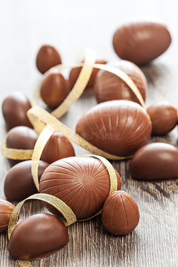 Easter Egg Shaped Chocolate Candies in a Nest Stock Photo - Image of ...