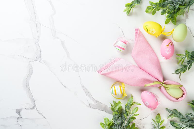 Easter Composition with Bunny Ears, Colored Eggs and Green Plants ...