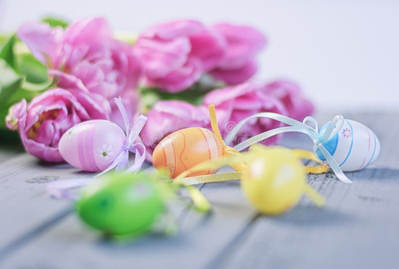 Easter Composition of Pink Roses and Colored Easter Eggs Stock Image ...