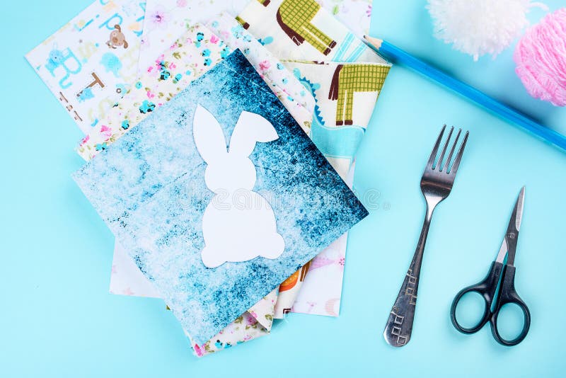 Easter Craft of Making Yarn Bunny Tail with a Fork Stock Image - Image ...