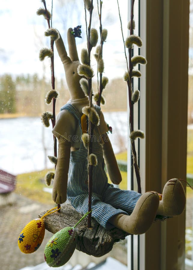 Easter Decor with Easter Bunny on a Swing, Decorated with Eggs and ...