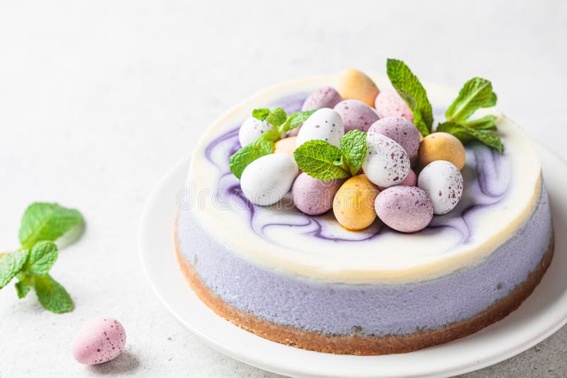 Easter Dessert. Berry Cheesecake Decorated with Easter Chocolate Eggs ...