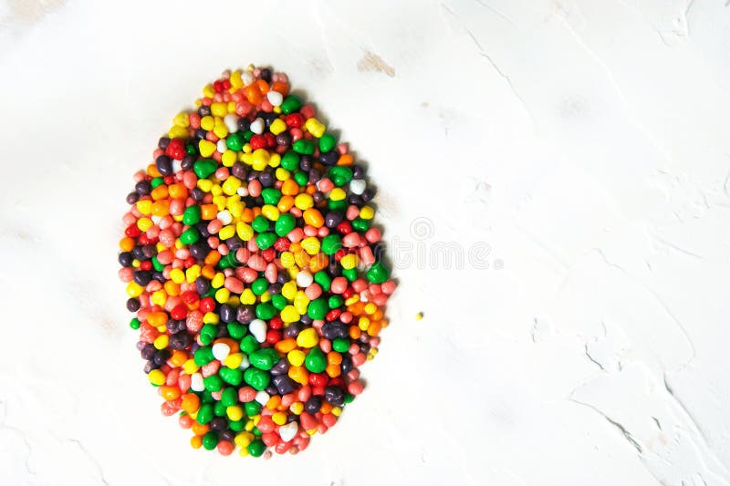 Easter Egg Shape Made of Rainbow Colored Candy. Flat Lay. Copy Space ...