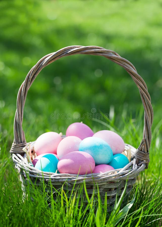 Easter eggs basket stock photo. Image of meadow, painted - 165577650