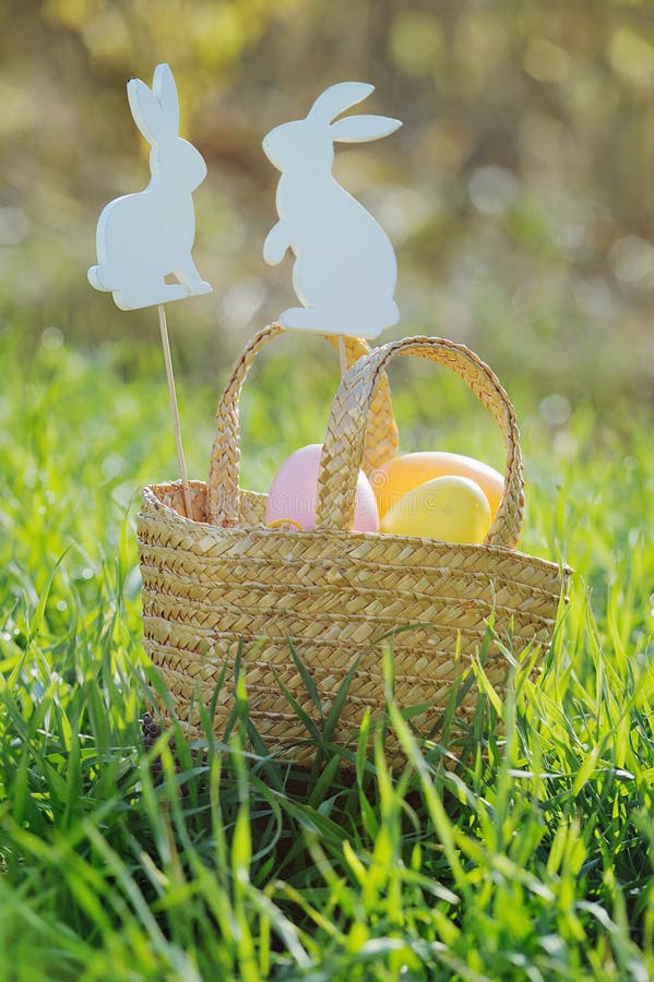 Easter Eggs in a Basket with Rabbit Decorations Stock Image - Image of ...
