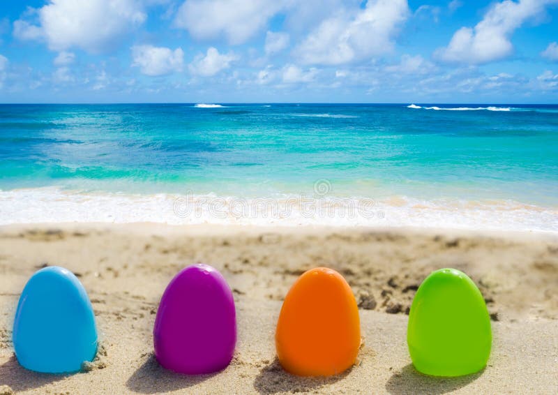 Easter eggs on the beach stock image. Image of bright - 36531307
