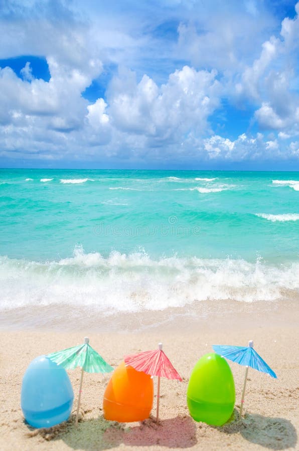 Easter eggs on the beach stock image. Image of bright - 36531307