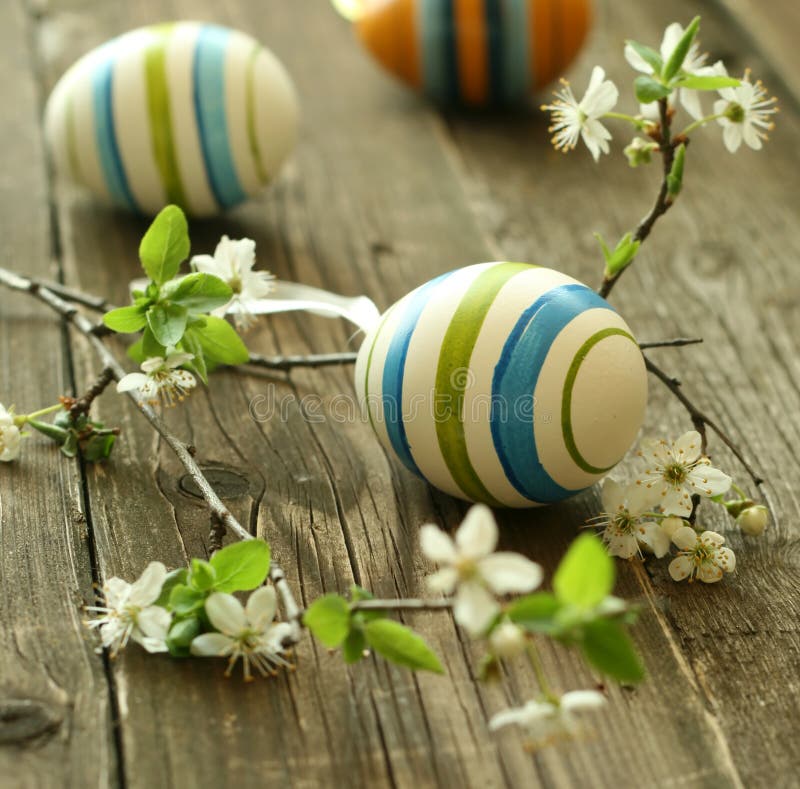 Easter Eggs and Branch with Flowers on Wooden Stock Image - Image of ...
