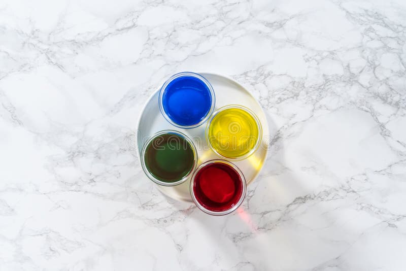 Coloring Hard-boiled White Eggs with Natural Food Coloring. Stock Photo ...