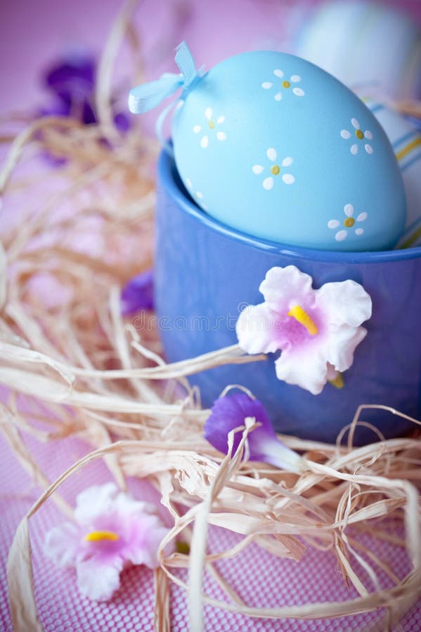 Easter eggs and flowers stock image. Image of feather - 28680239