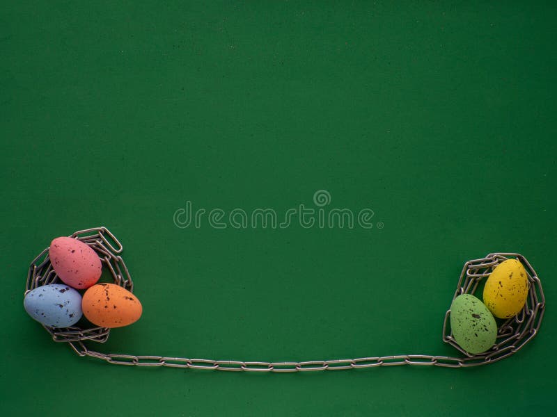 Easter Eggs on Green Background with Metal Chain Stock Photo - Image of ...