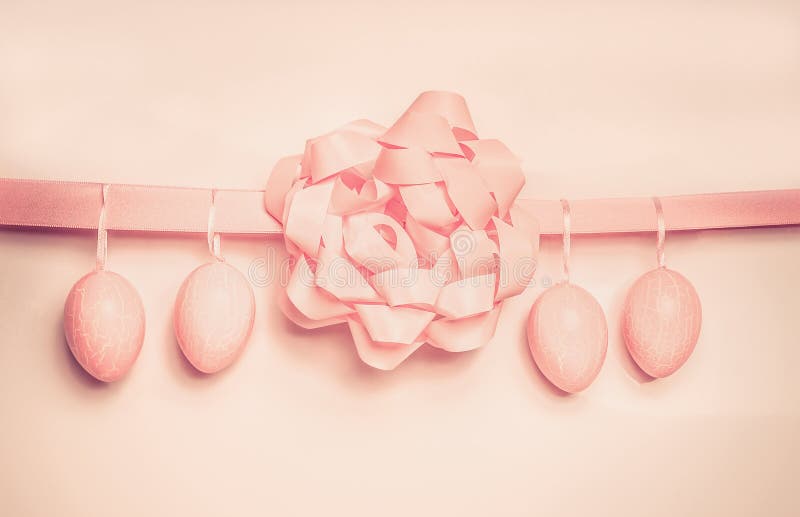 Easter Eggs Hanging on Pink Ribbon with Bow Stock Image - Image of ...