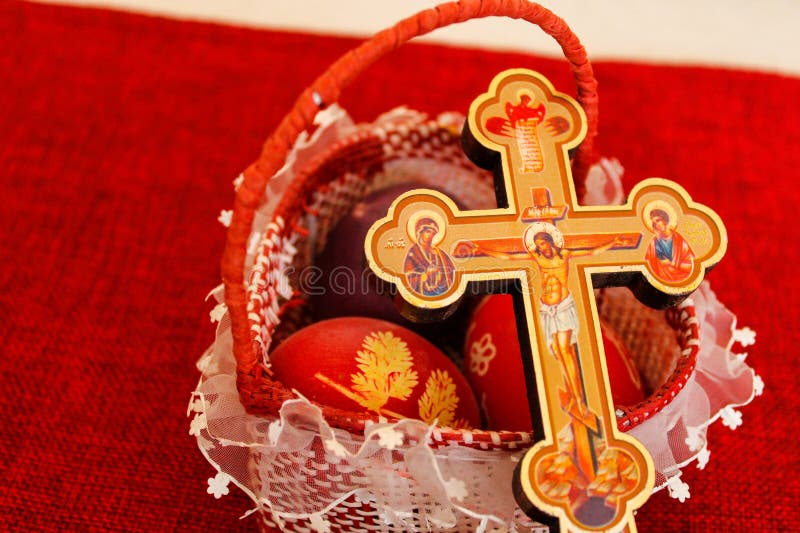Easter Eggs in the Heart Shaped Basket with Christian Cross on it Stock ...