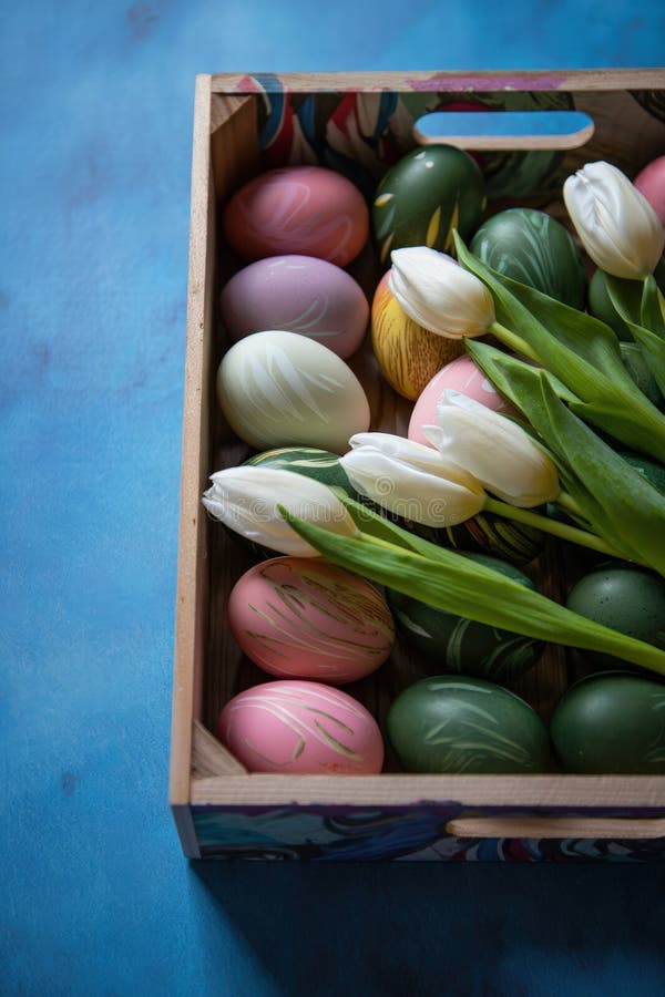 Easter Eggs and Tulips Creating a Spring Feeling on Pastel Green ...