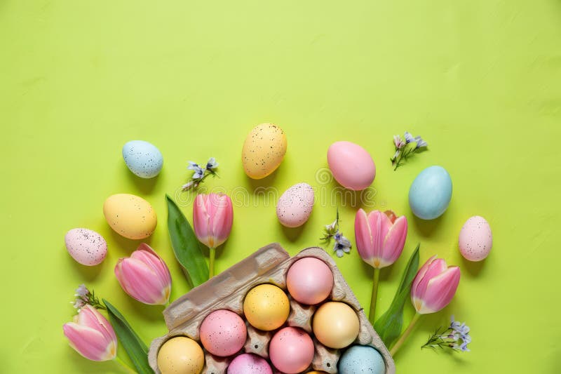 Easter Eggs and Tulips Creating a Spring Feeling on Pastel Green ...