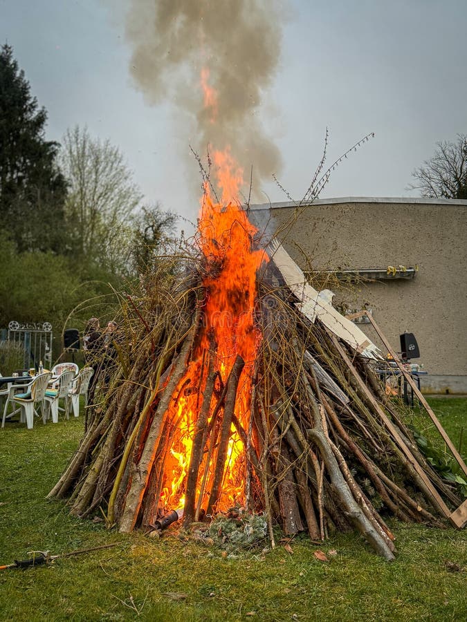 An Easter Fire Burns in the Meadow Stock Photo - Image of yellow, fuel ...