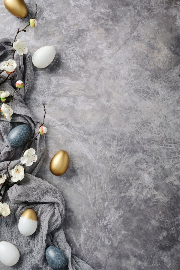 Easter Flat Lay Featuring Elegant Golden and Speckled Eggs and Blooming ...
