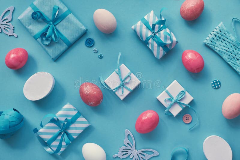 Easter Flat Lay in White and Pink on Blue Mint Paper Background with ...