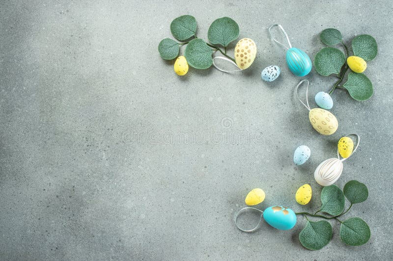 Easter Frame of Eggs and Green Leaves on Gray Background. Happy Easter Holiday Concept Stock ...