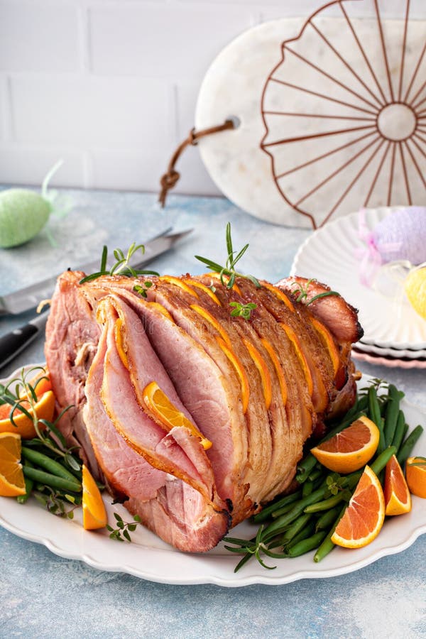Easter Ham Stuffed with Orange Slices, Spiral Sliced Glazed Ham Stock Photo - Image of pork ...