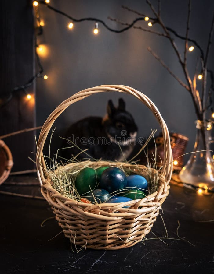 Easter Holiday: a Little Black Easter Bunny and a Wicker Basket with ...
