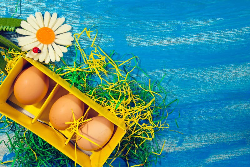 Easter Motives on a Blue Wooden Background Stock Photo - Image of ...