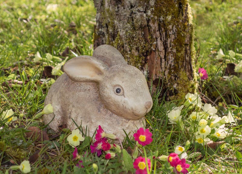 Easter - Rabbit Made of Ceramic in the Blooming Garden Stock Image ...