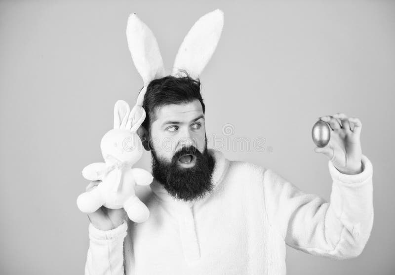Weirdo Concept. Celebrate Easter. Guy Bearded Hipster Weird Bunny With ... Weirdo Concept. Celebrate Easter. Guy Bearded Hipster Weird Bunny With ...