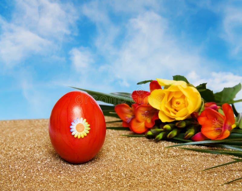 Easter Red Decorated Egg And Flowers Over Blue Sky Picture. Image: 8370995