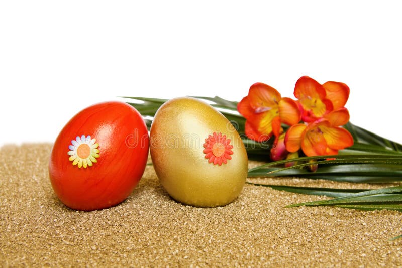 Easter Red and Golden Eggs with Freesia Flower Stock Image - Image of ...