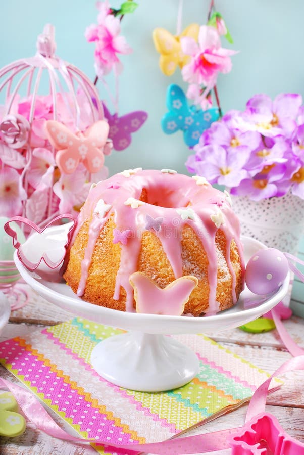 Easter Ring Cake with Pink Icing on the Top Stock Photo - Image of ...