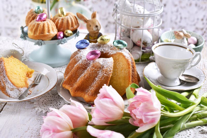 Easter Ring Cake with Powdered Sugar on Festive Table Stock Image ...