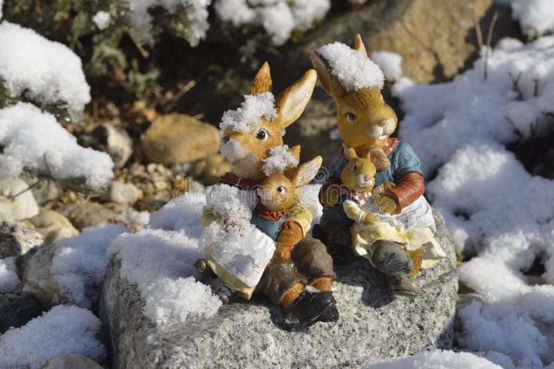 Easter bunny meets Snowman stock photo. Image of snow - 85634748