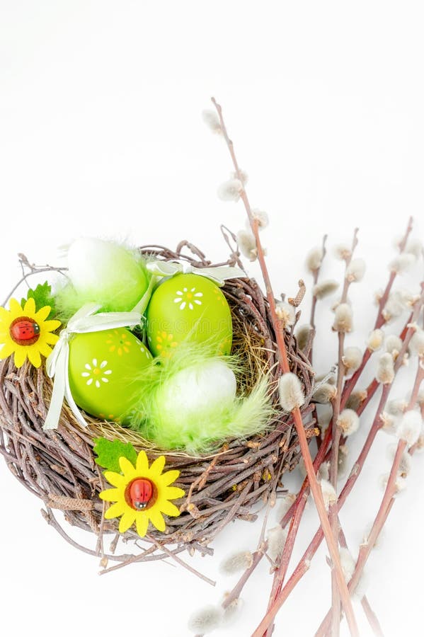Easter Still Life. Easter Decorated Eggs in a Nest with a Bouquet of ...