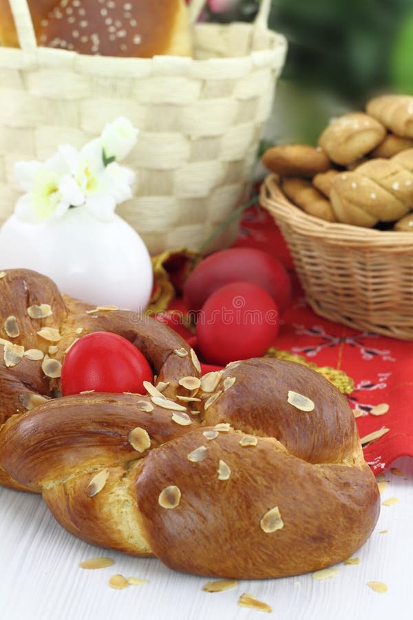 Colored Easter Eggs and Flowers on a Turquoise Table Stock Photo ...