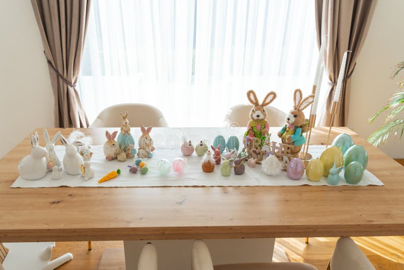 Easter Table Display with Colorful Eggs and Bunny Figurines Stock Photo ...