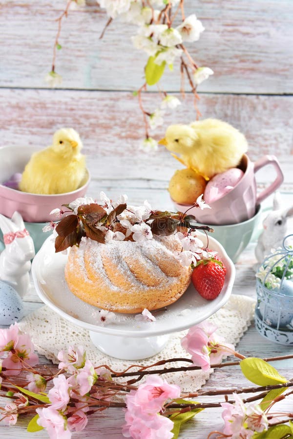 Easter Table with a Ring Cake and Spring Decorations Stock Photo ...