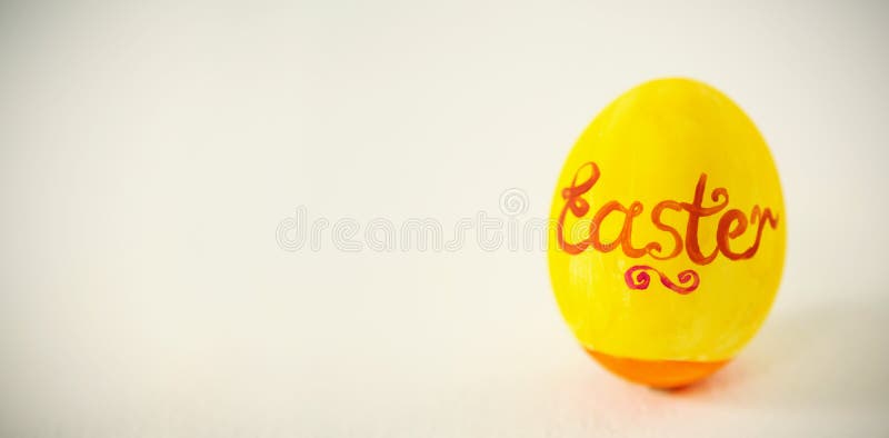 Easter text written on egg stock photo. Image of painted - 89696018