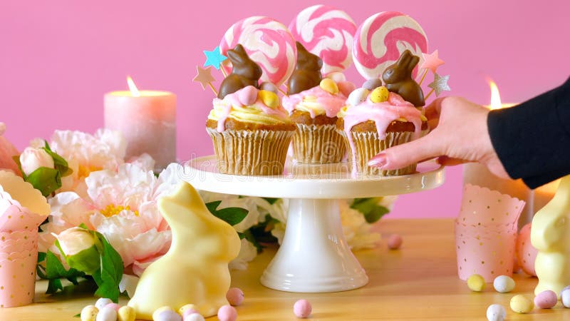 Easter Theme Candy Land Drip Cupcakes in Party Table Setting. Stock ...