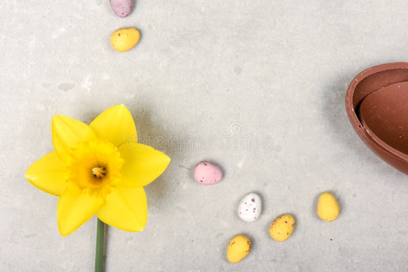 Easter Time Background on Table Top View with Chocolate Easter Egg and ...