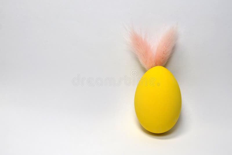 Easter yellow bunny egg stock photo. Image of minimal - 212367780