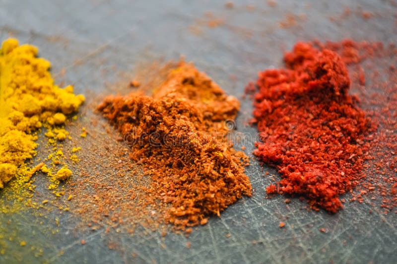 Eastern Condiments Scattered on a Table at Home. Turmeric and Pe Stock ...