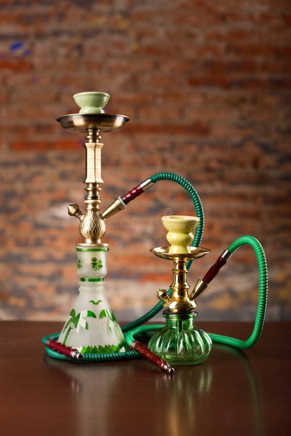 Eastern Hookahs on Wood Table Stock Photo - Image of addiction ...