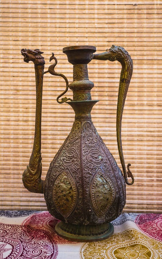 Eastern Pitchers Stand on a Shelf Stock Photo - Image of qatar, arab ...