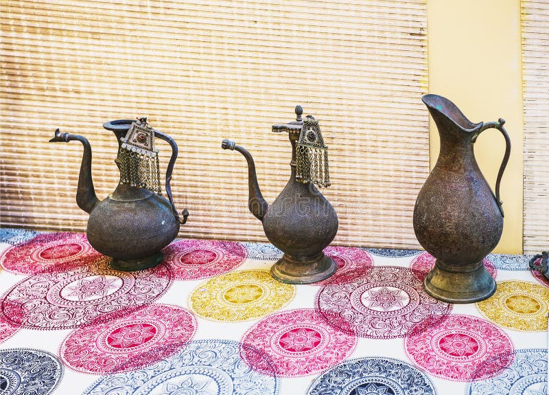 Eastern Pitchers Stand on a Shelf Stock Photo - Image of market ...