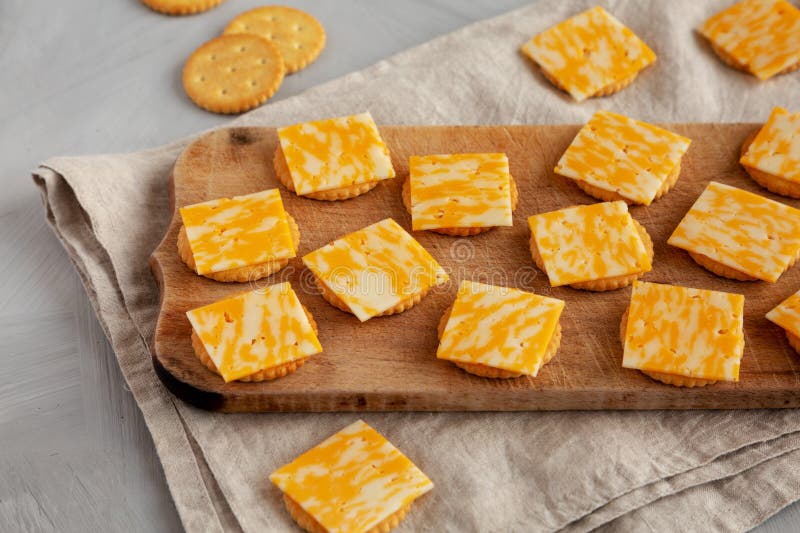 Easy Cheese and Crackers on a Wooden Board, Side View Stock Image ...