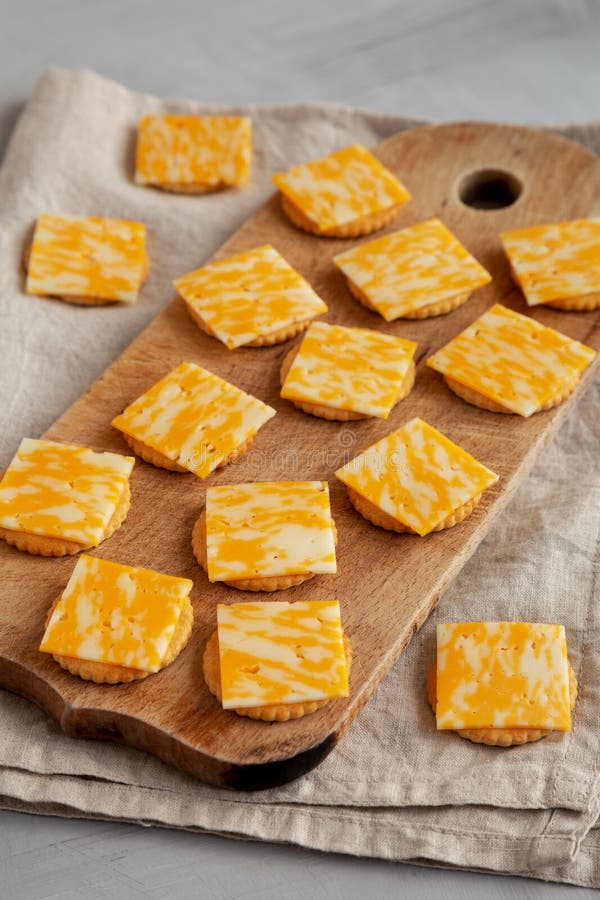 Easy Cheese and Crackers on a Wooden Board, Side View Stock Image ...