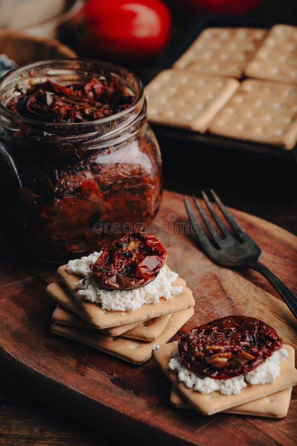 Easy Snack with Crackers, Sun-dried Tomatoes and Cream Cheese Stock ...
