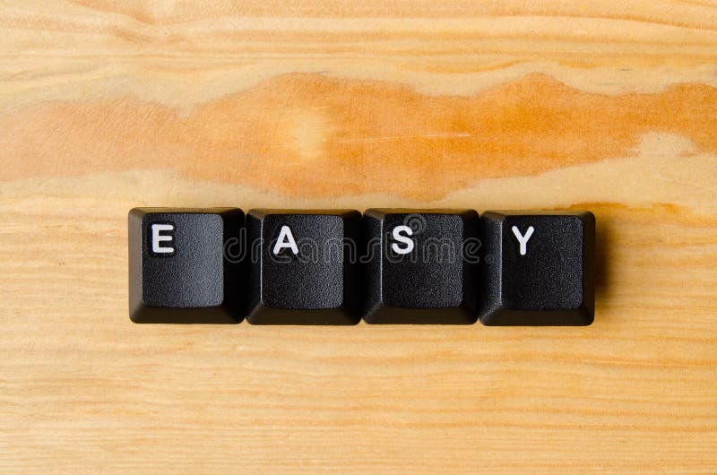 Easy word stock image. Image of keyboard, wood, typo - 95052981